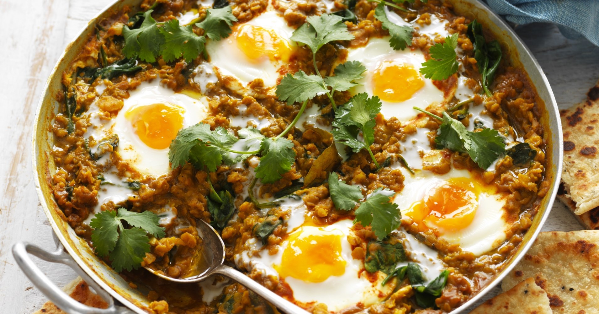 Spinach and Lentil Dhal with Baked Eggs Recipe | myfoodbook